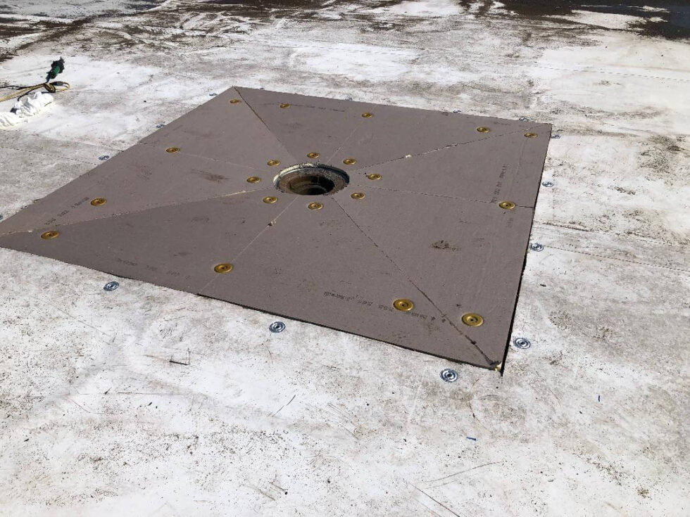 How to Slope a Commercial Flat Roof for Proper Drainage